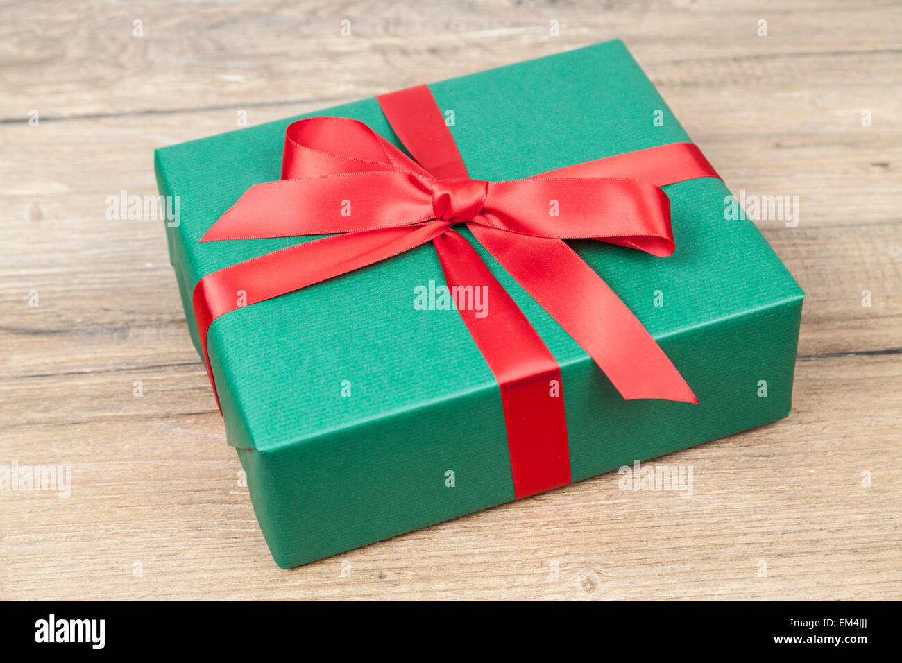 Green Christmas present Stock Photo - Alamy