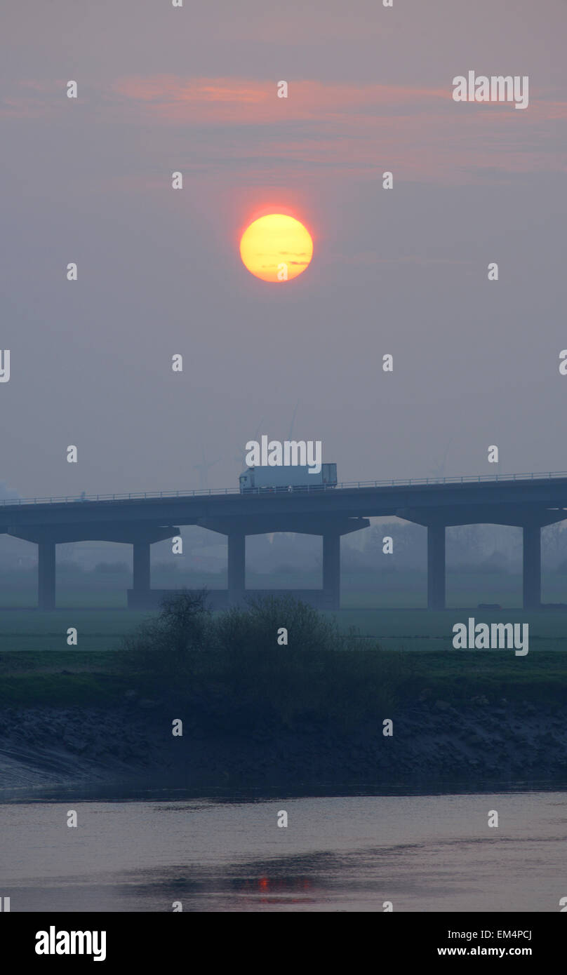 sunrise over traffic using the M62 motorway Ouse bridge crossing the ...