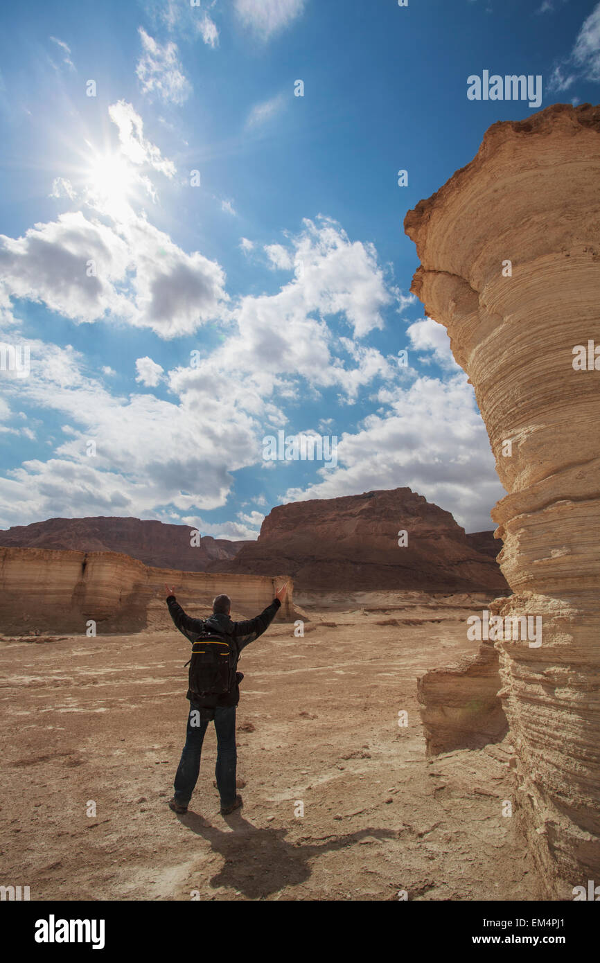 A Man With Arms Raised At Masada A Place Of Ancient Fortifications ...