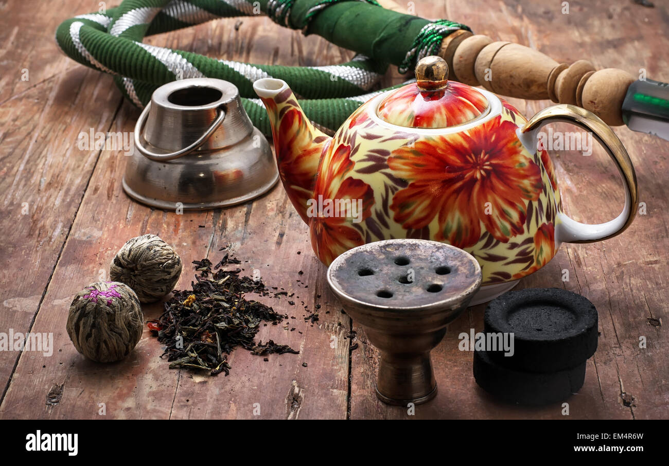 accessories to smoking hookah and dry tea leaves.Selective focus Stock ...