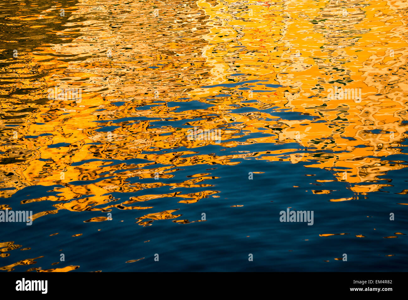 Color reflections on the sea Stock Photo - Alamy