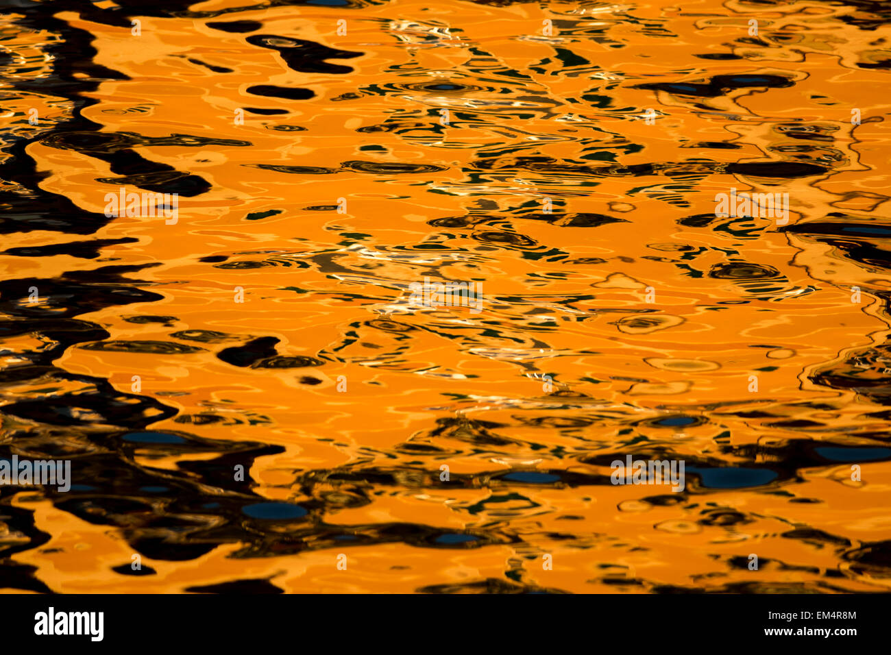 Color reflections on the sea Stock Photo - Alamy