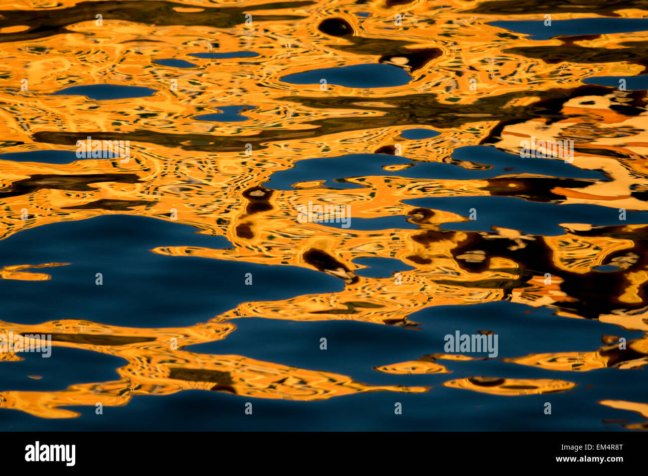 Color reflections on the sea Stock Photo - Alamy