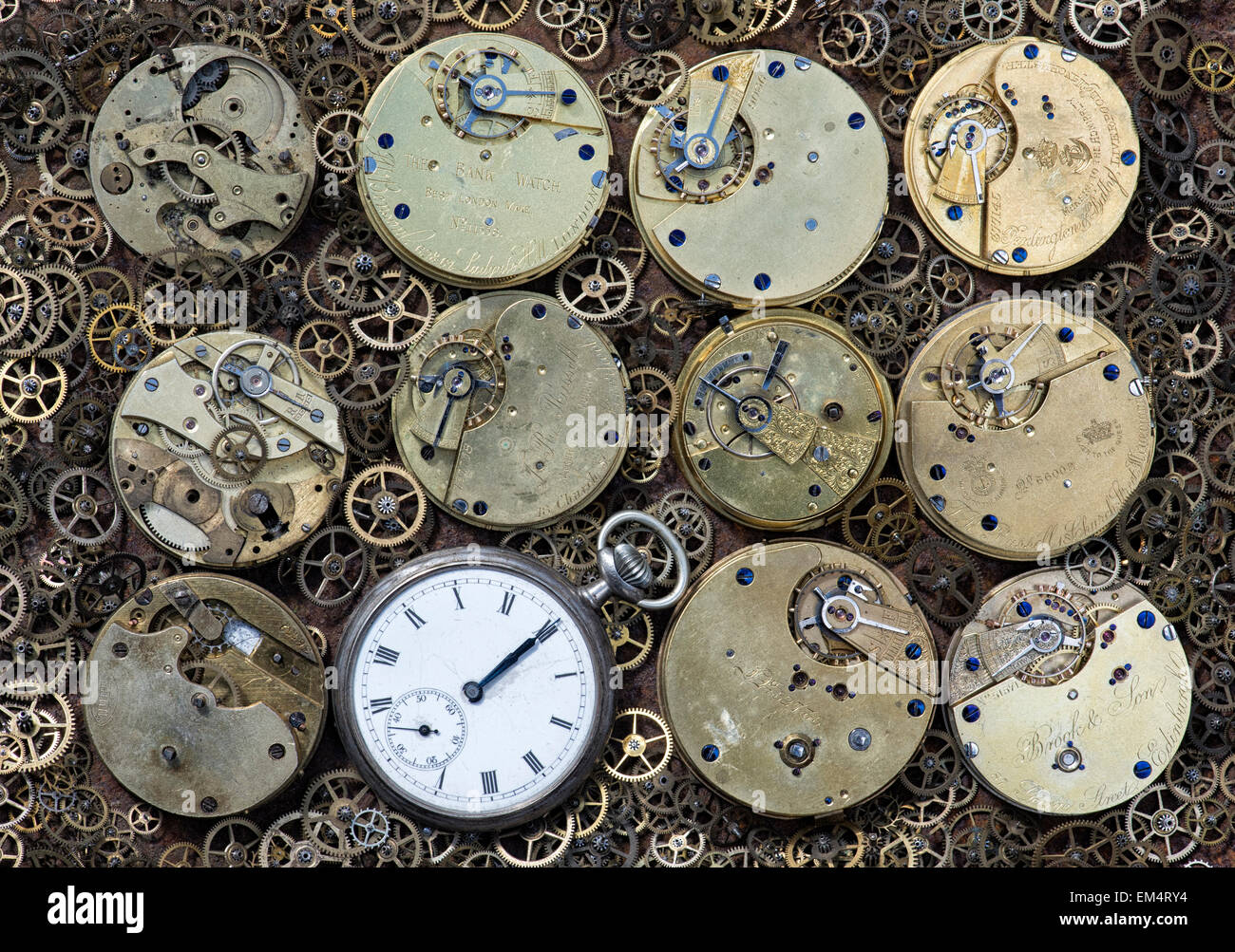Old pocket watches, movements and cogs Stock Photo - Alamy