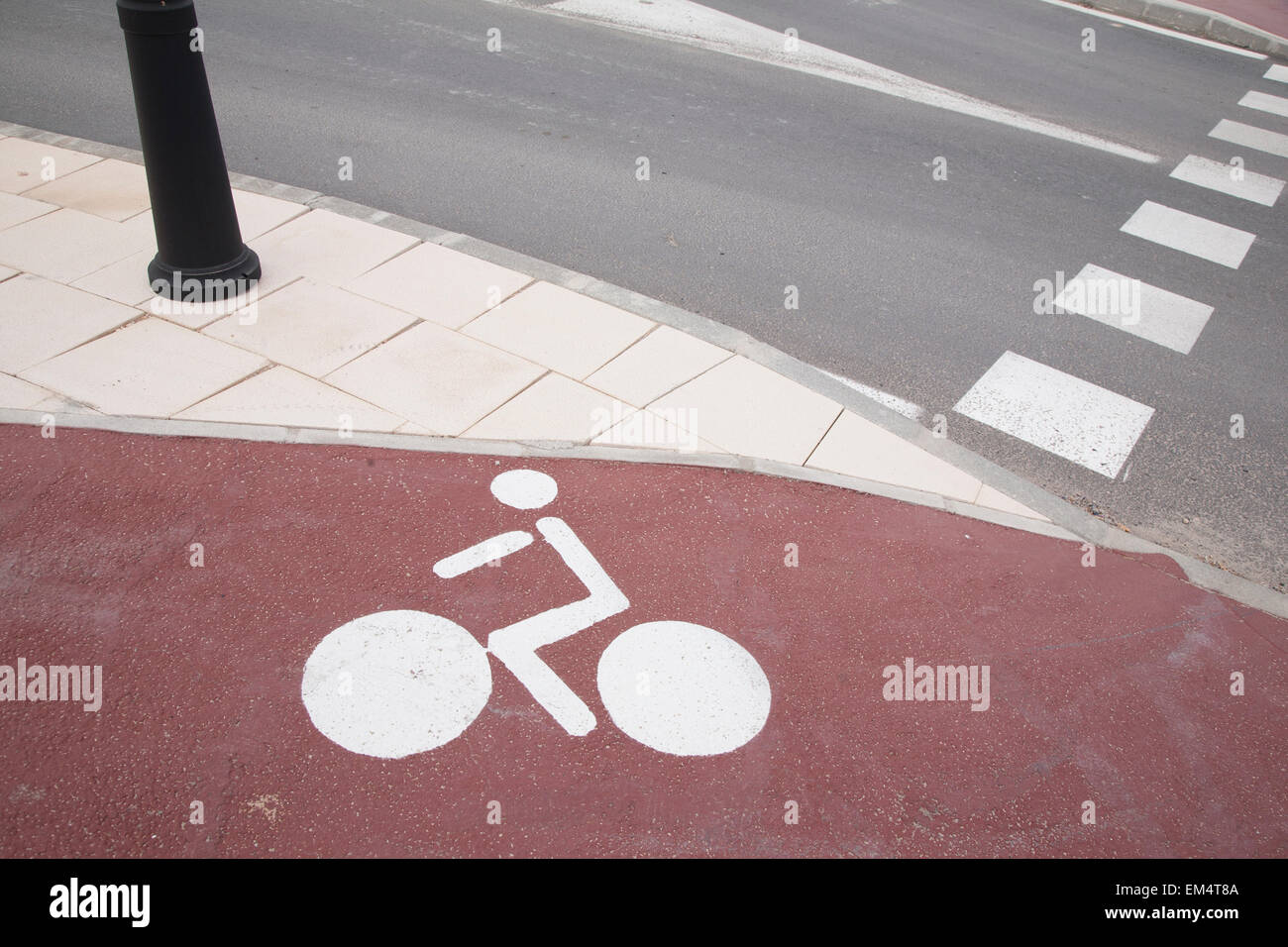 White Bike Symbol in Urban Setting Stock Photo - Alamy