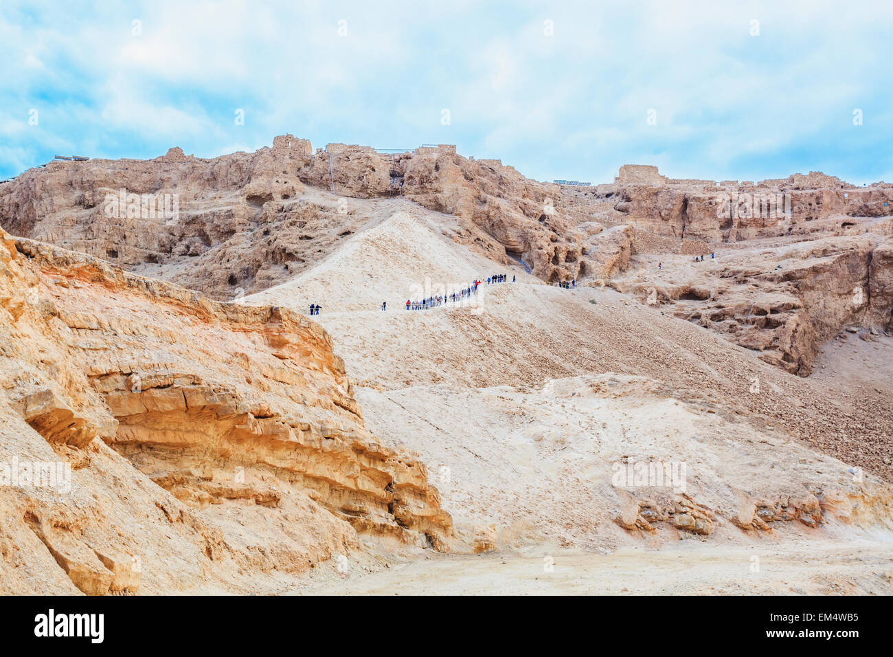 A Group Of People Walking Up A Path At The Ancient Fortification Masada ...