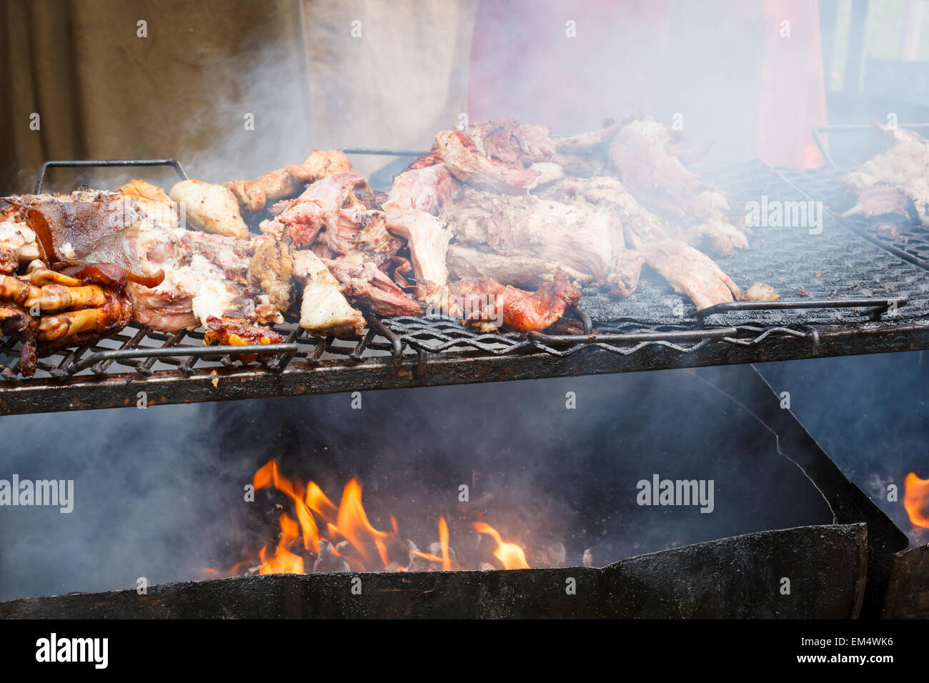 Pork meat grilled in open fire Stock Photo - Alamy