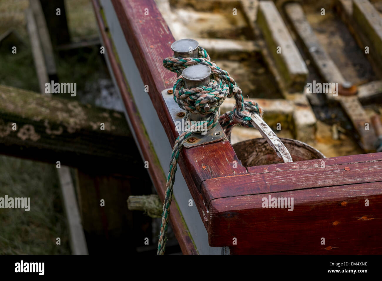 Back of small boat showing the capstan mooring points with rope ...