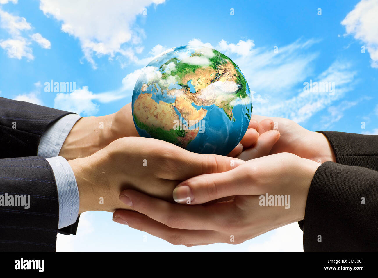 Earth planet in hands Stock Photo - Alamy