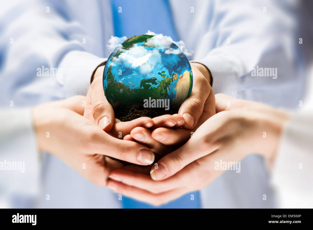 Earth planet in hands Stock Photo - Alamy