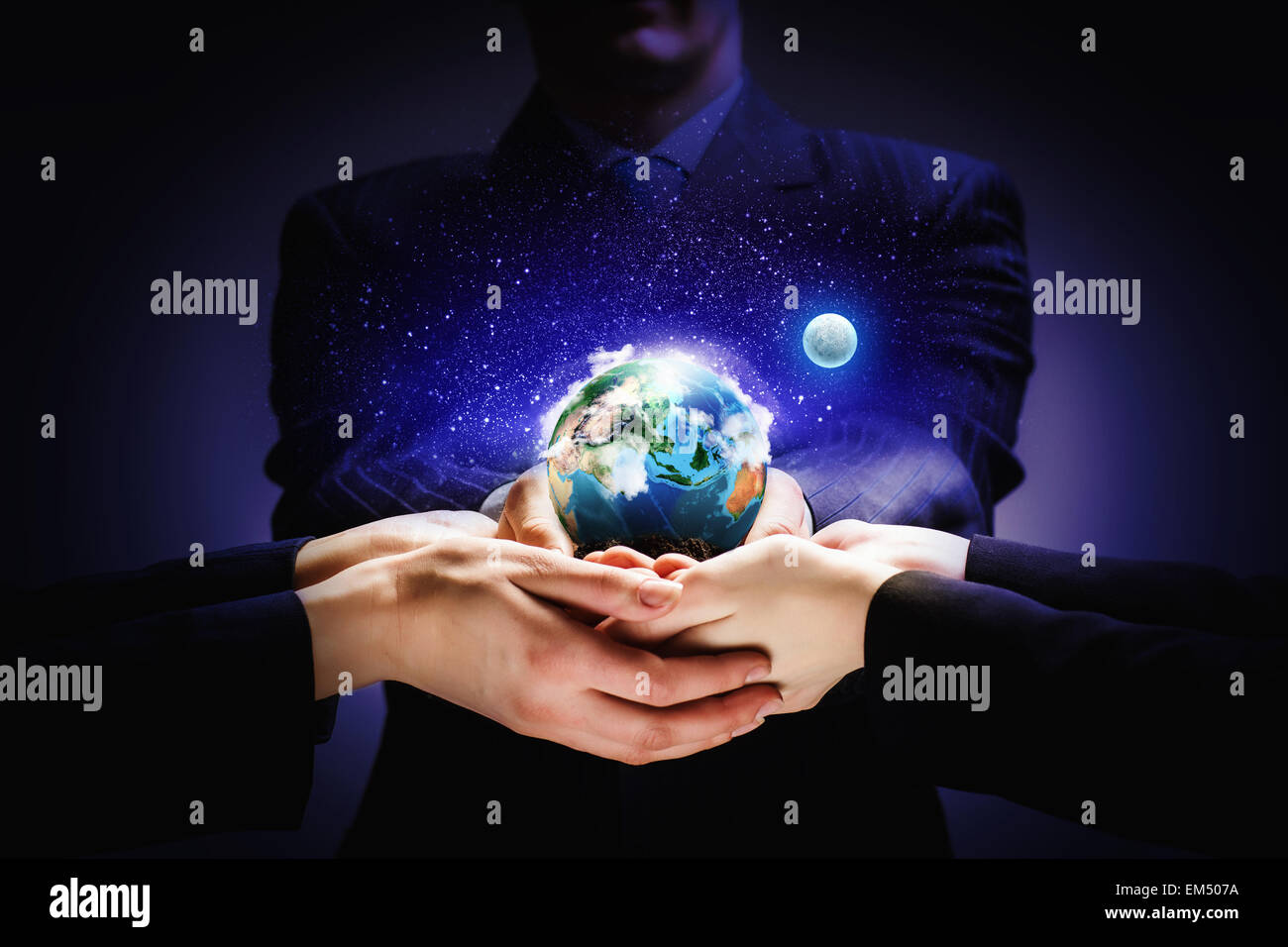 Earth planet in hands Stock Photo - Alamy