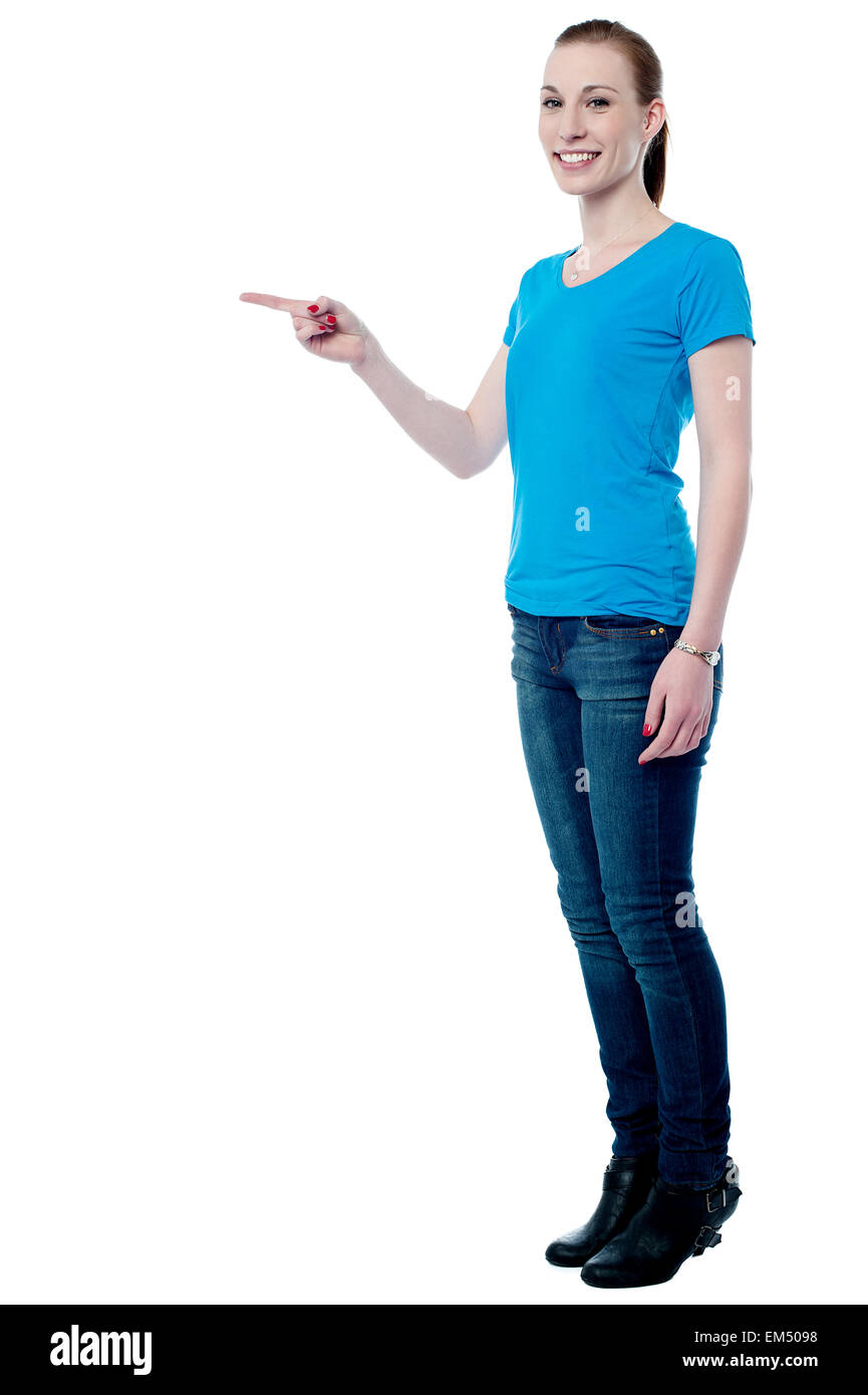 Young lady pointing away Stock Photo - Alamy