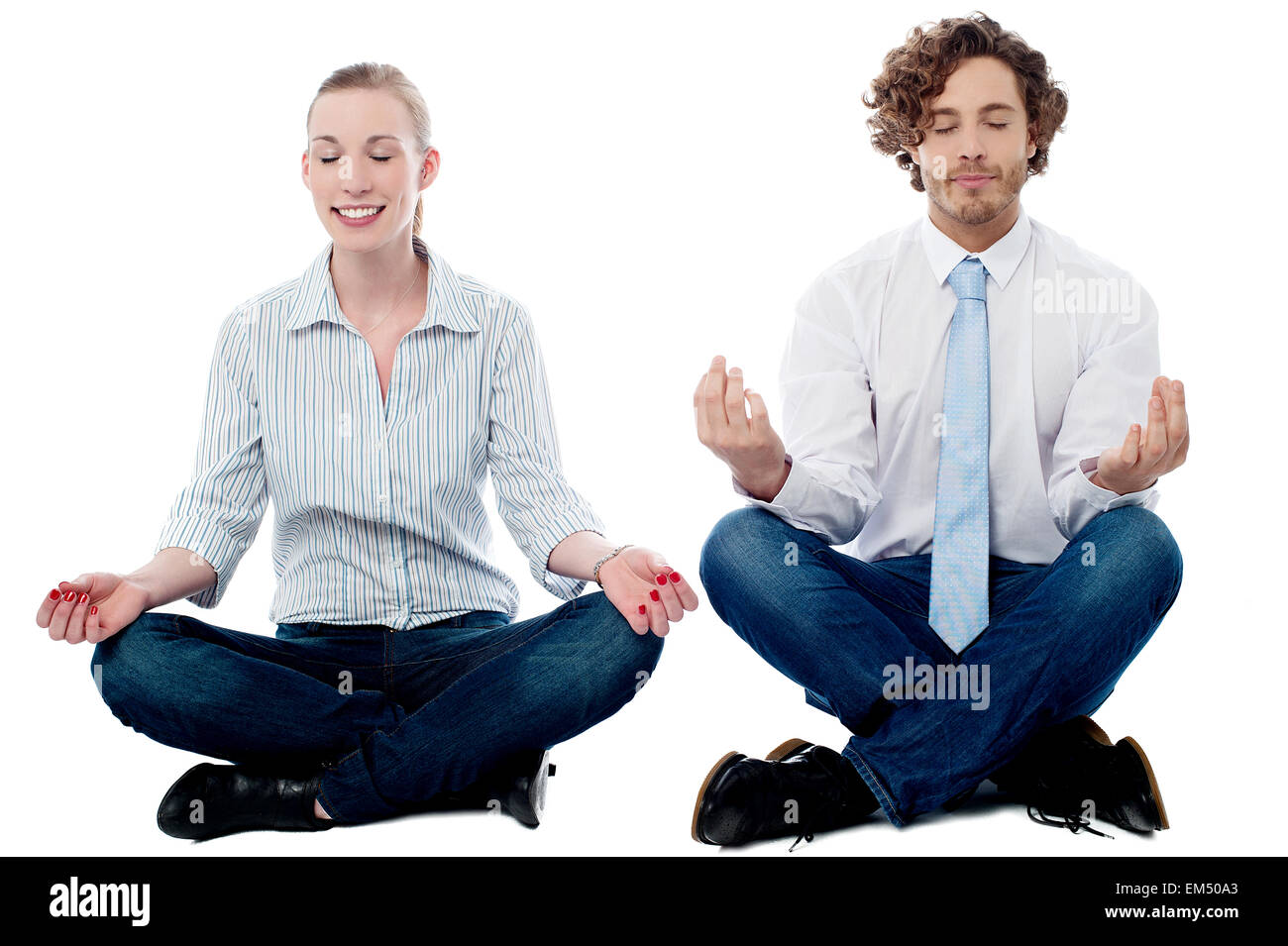 Business people practicing meditation Stock Photo - Alamy