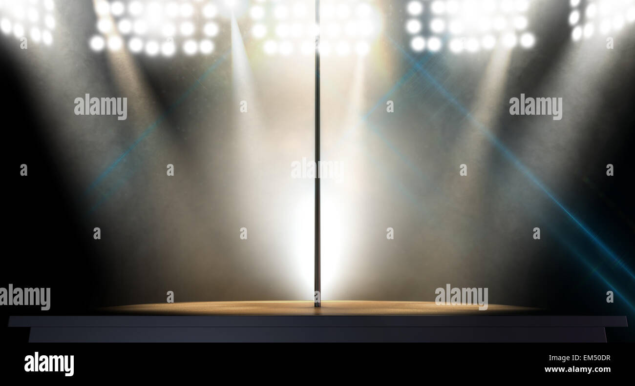 An isolated stripper pole on a stage lit by an array of spotlights on a ...
