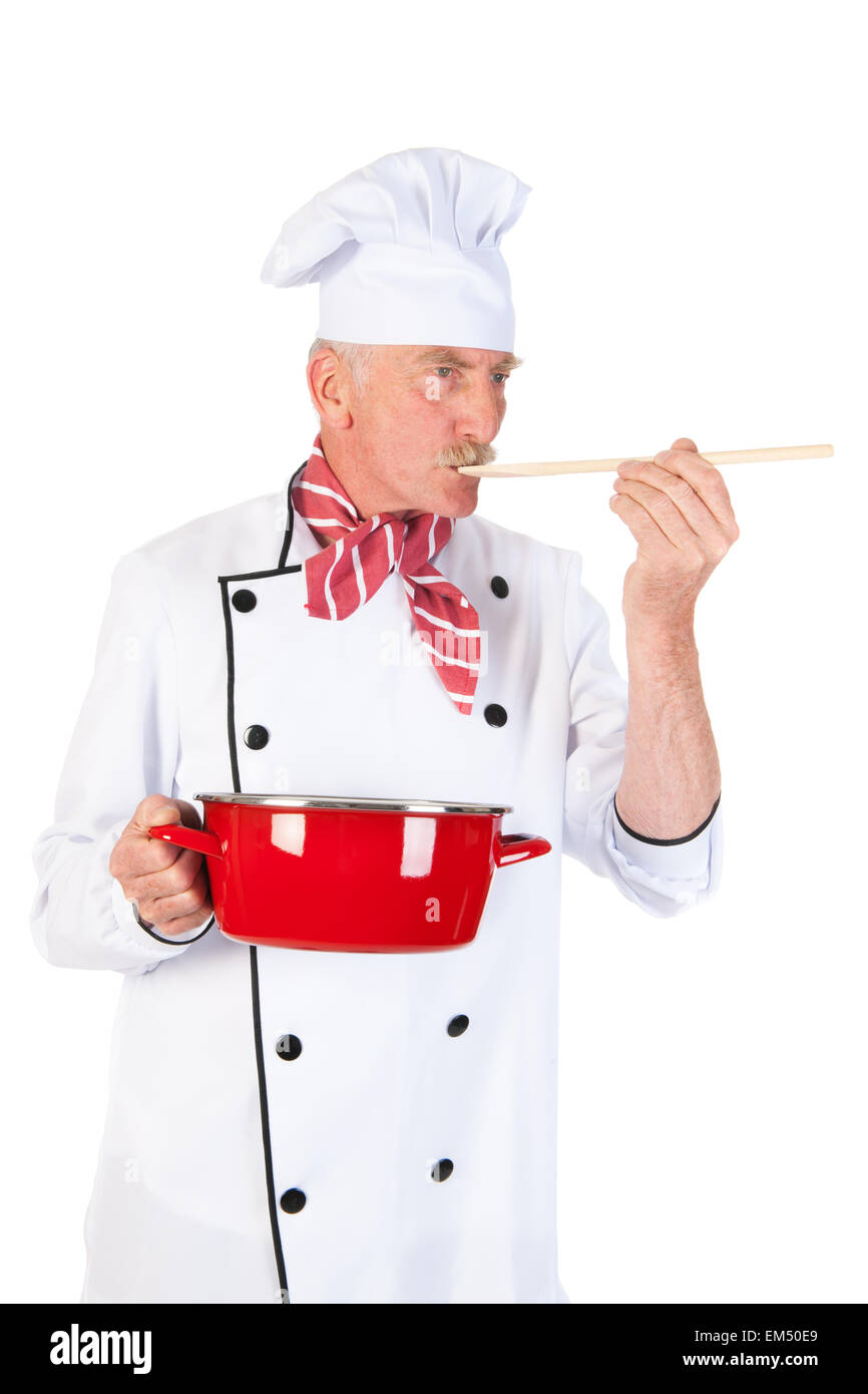 Cook taste the food Stock Photo - Alamy