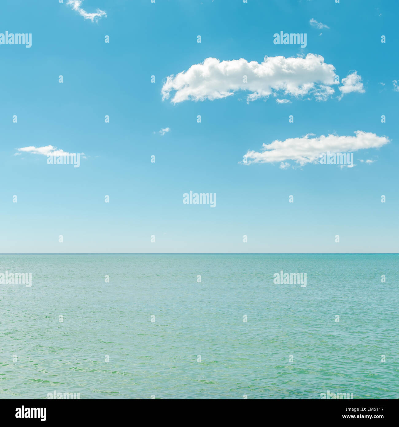azure sea and blue sky with clouds Stock Photo - Alamy