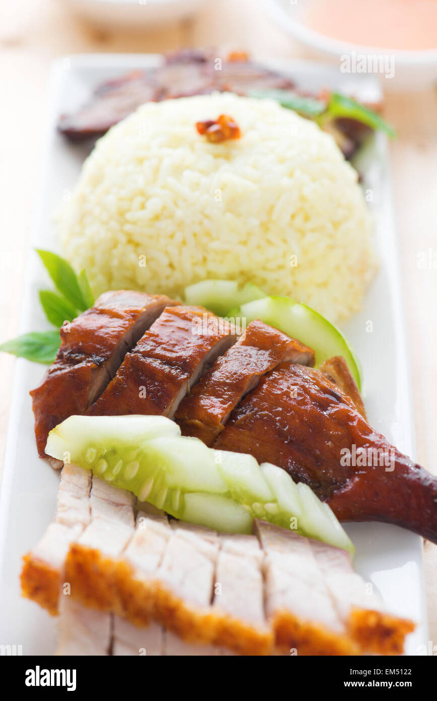 Roasted duck and roasted pork crispy siu yuk rice Stock Photo - Alamy
