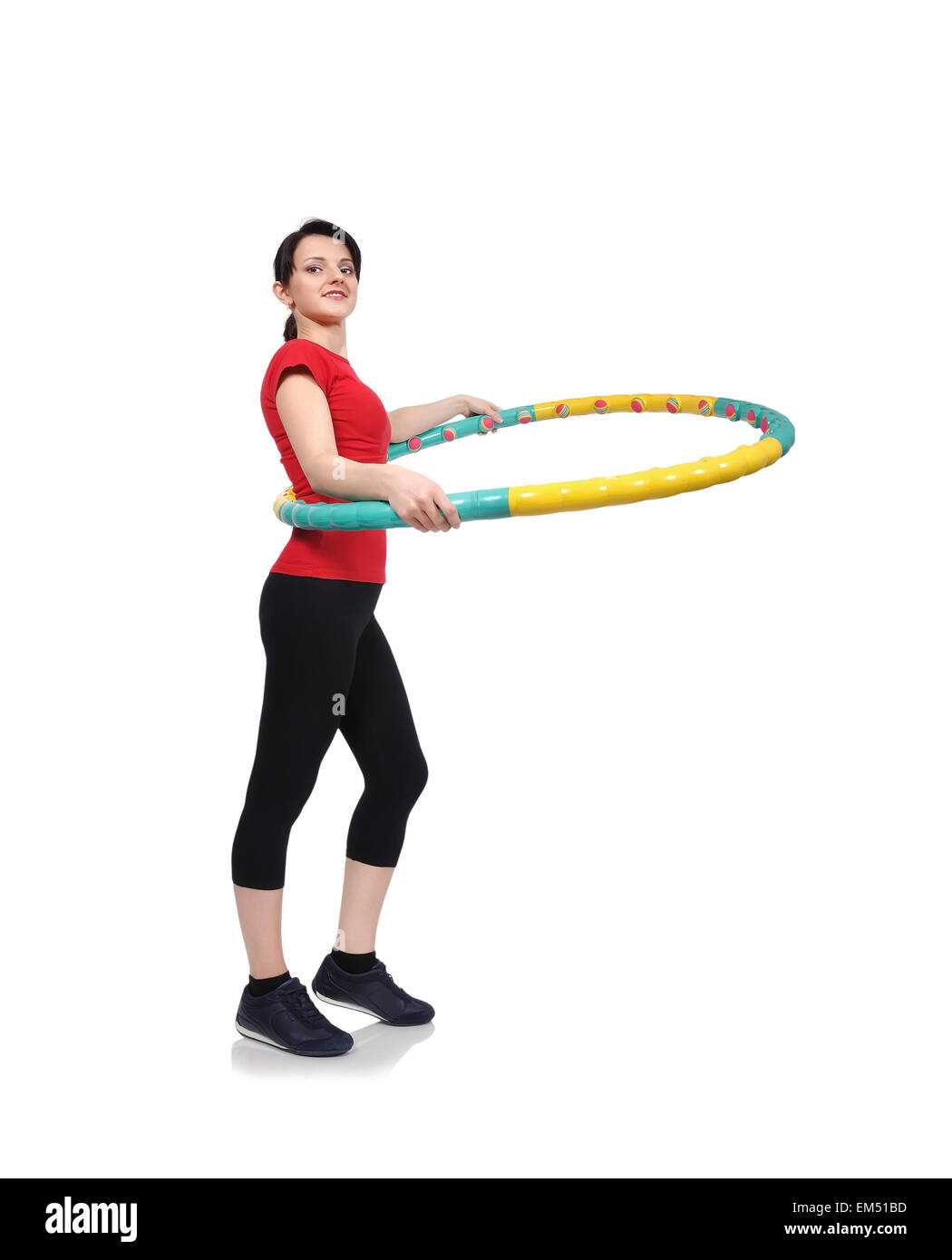 girl holding color hula hoop on white background Stock Photo - Alamy