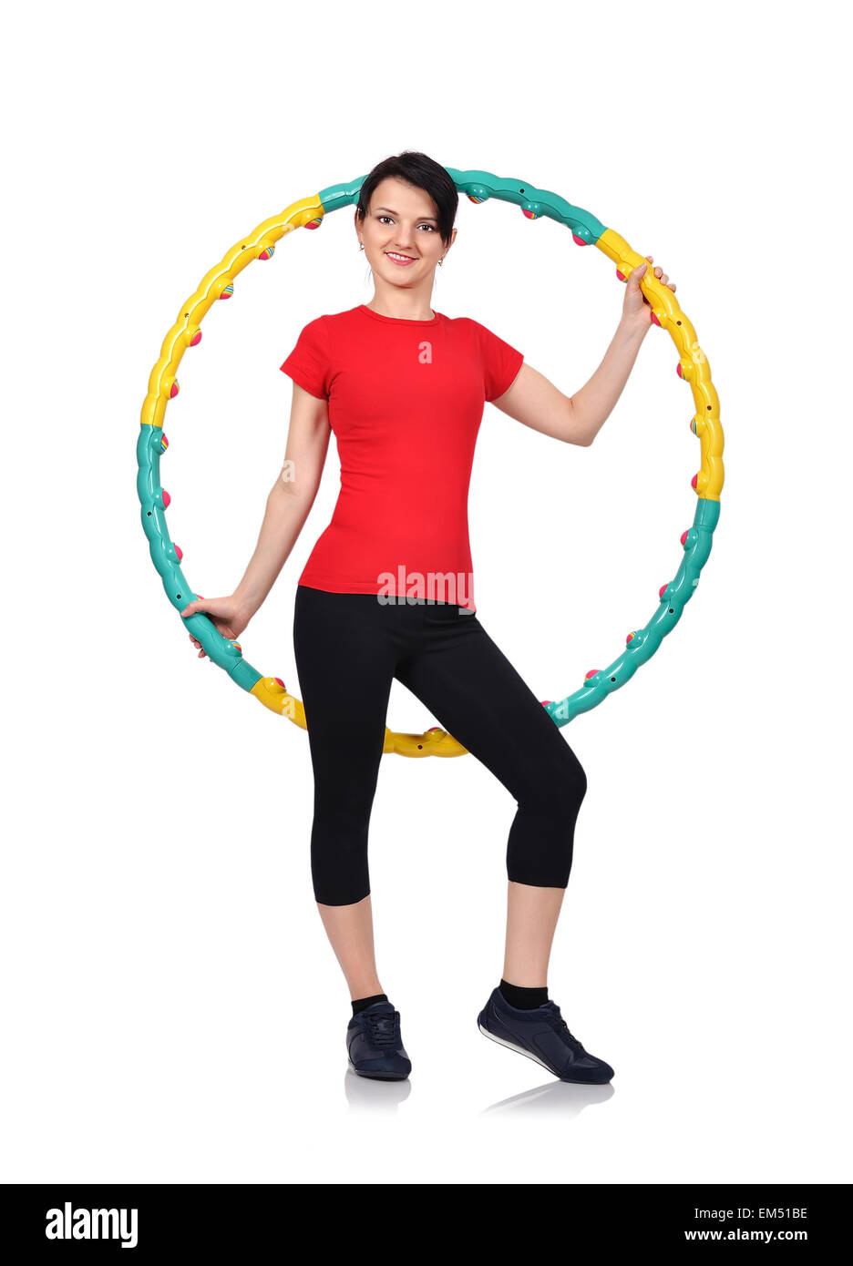 Young fitness woman holding color hula hoop Stock Photo - Alamy