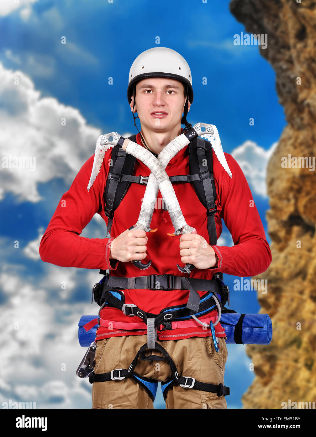 hiker with ice axe on mountain background Stock Photo - Alamy