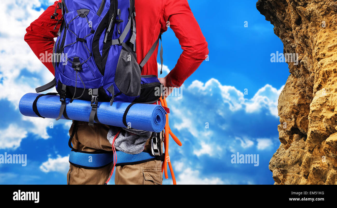 Climber looking at mountain peak hi-res stock photography and images ...