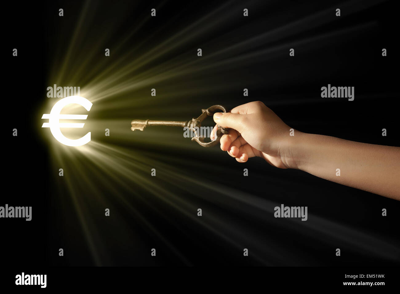 Hand with key Stock Photo - Alamy