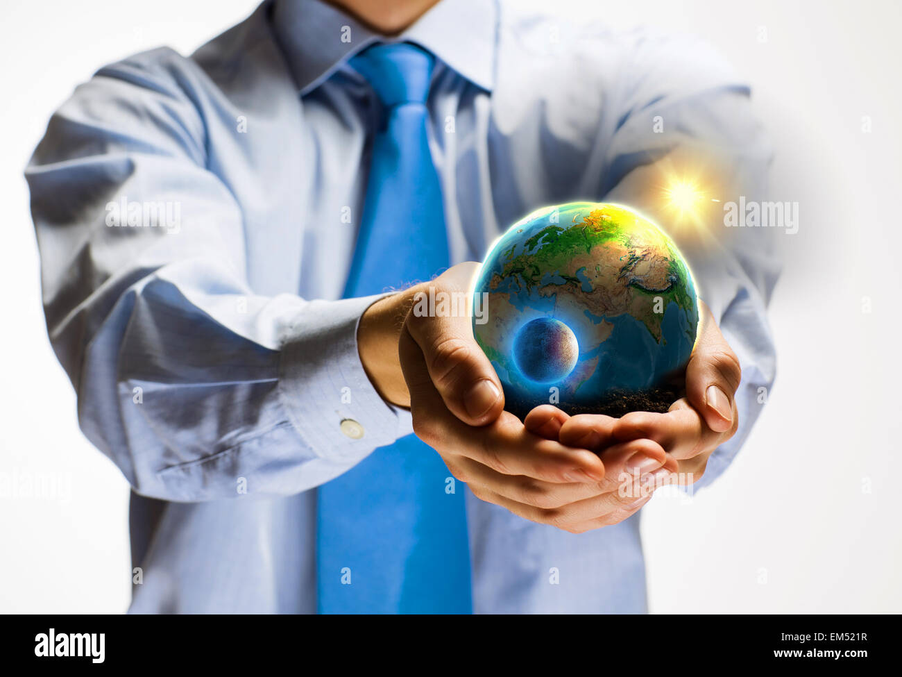 Earth planet in hands Stock Photo - Alamy