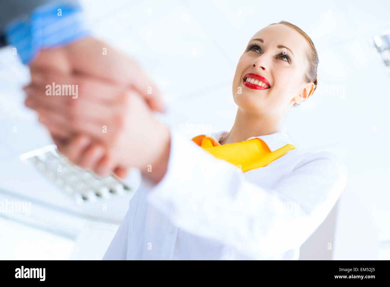 business woman shaking hands with a client Stock Photo - Alamy