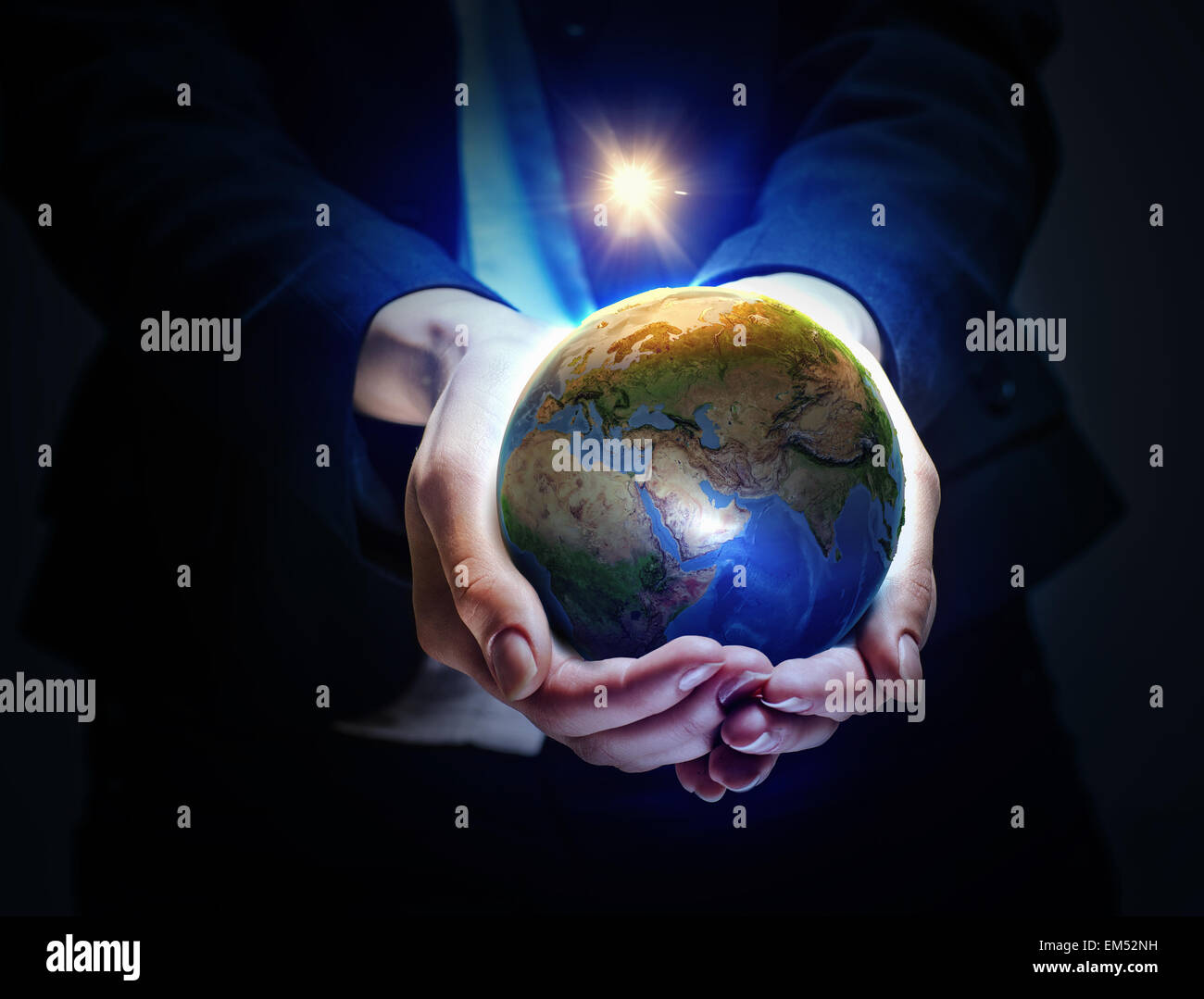 Earth planet in hands Stock Photo - Alamy