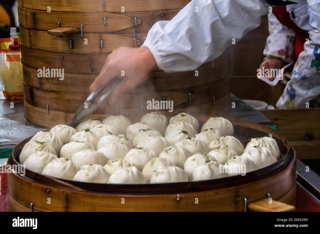 China, Beijing, Cook steaming food Stock Photo - Alamy