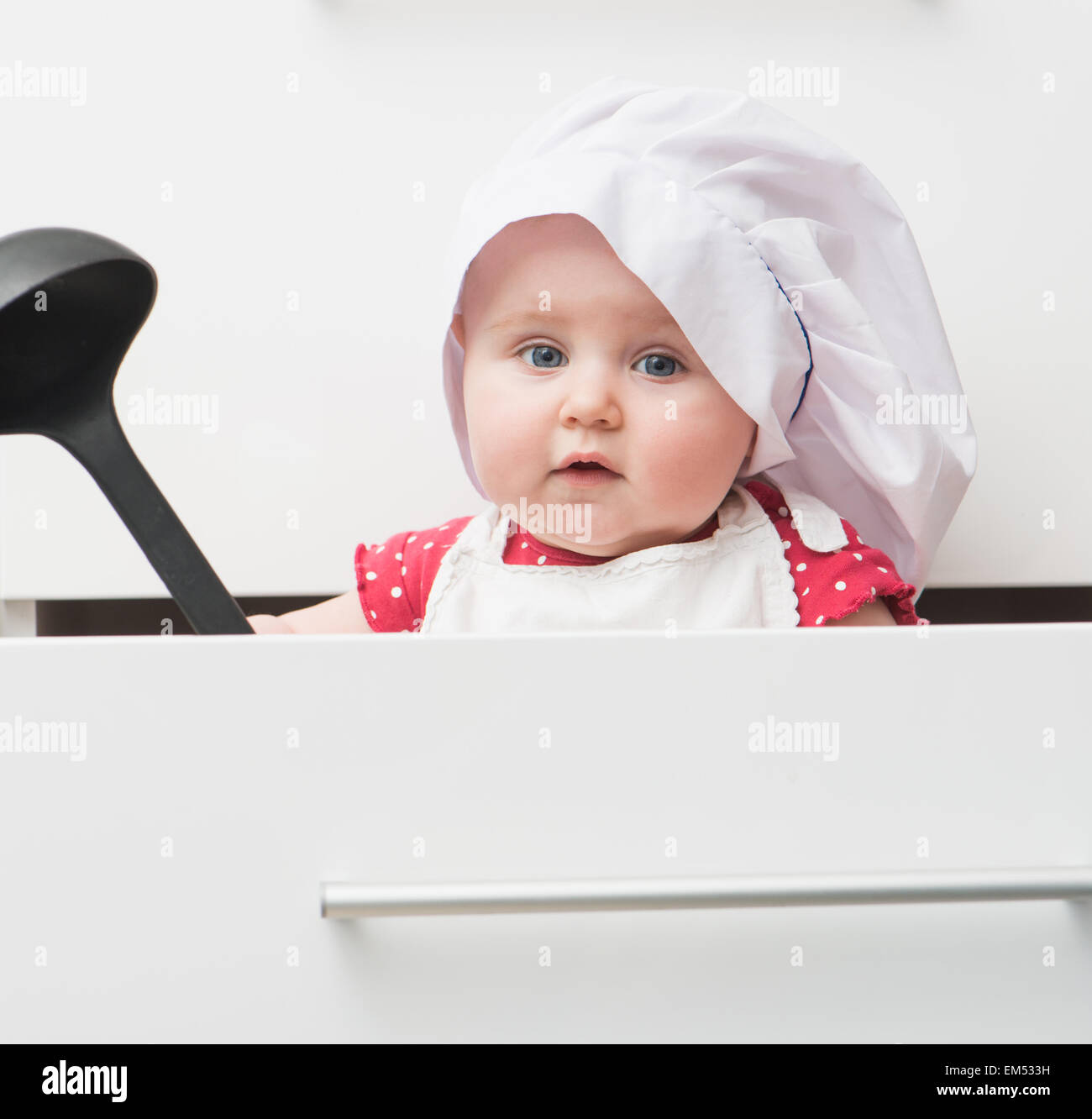little baby in a chef's hat Stock Photo - Alamy