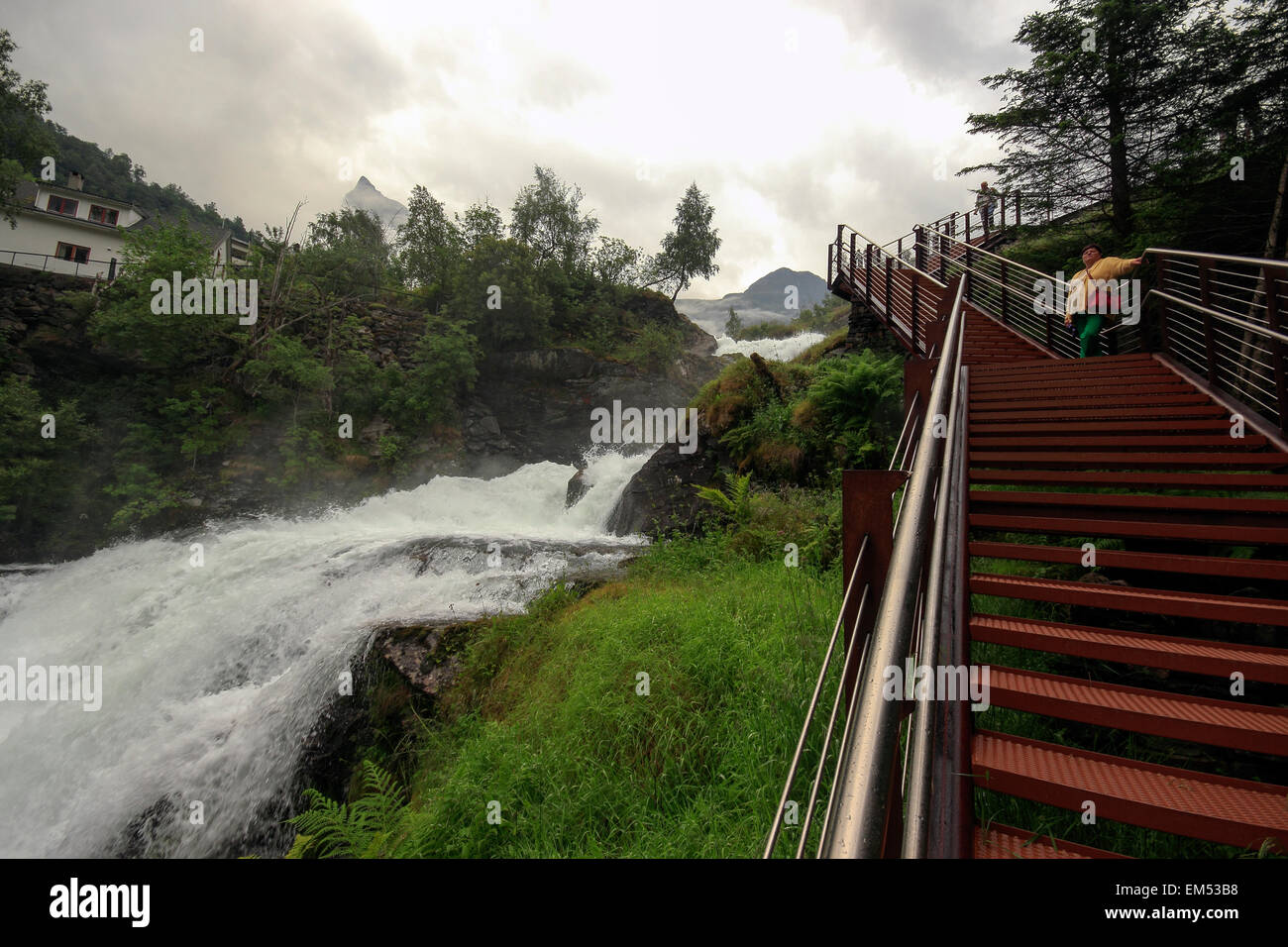 Tourists along a riverwalk, Geiranger, Norway, Scandinavia, Europe ...