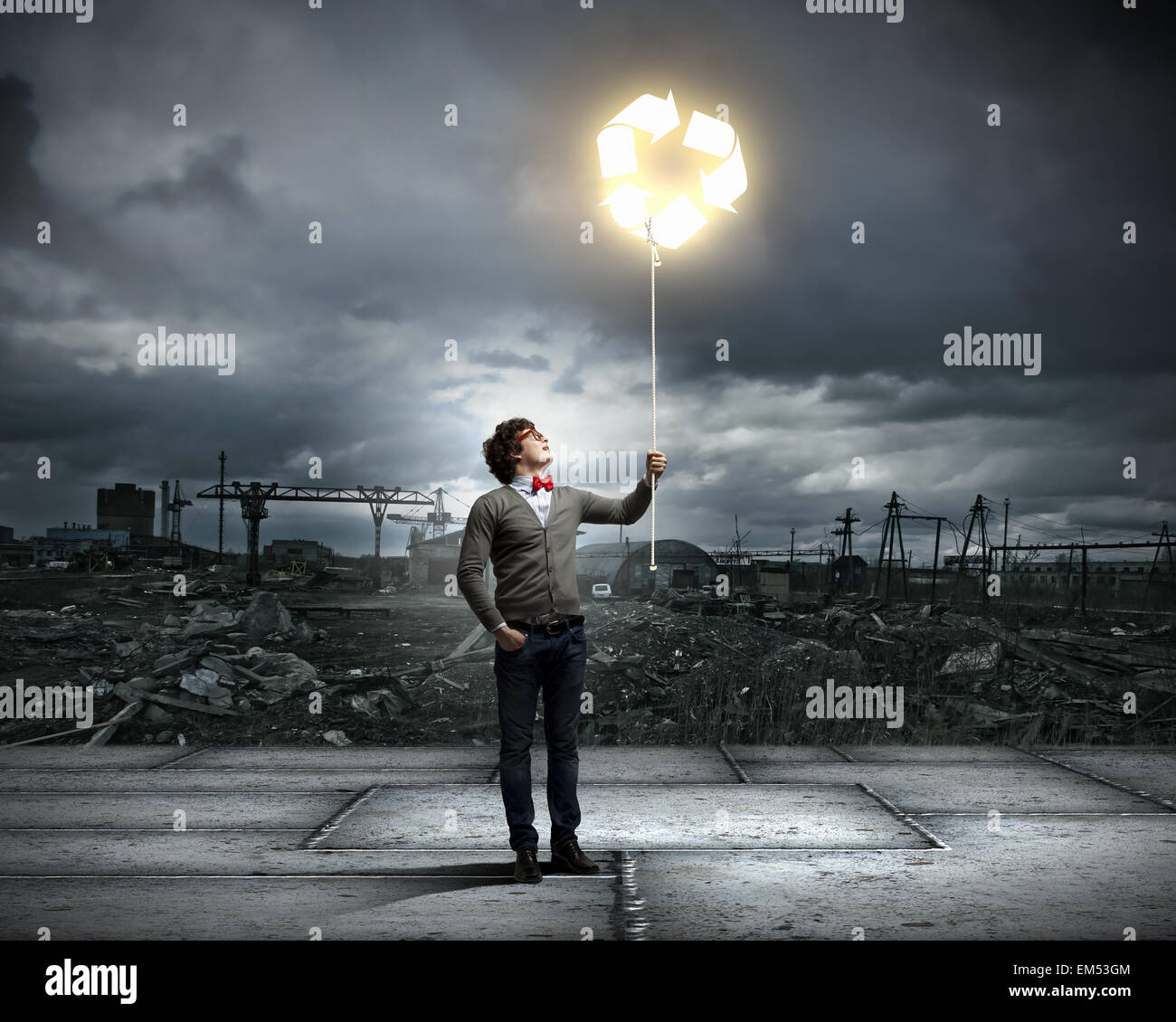Young man with a recycle symbol Stock Photo - Alamy