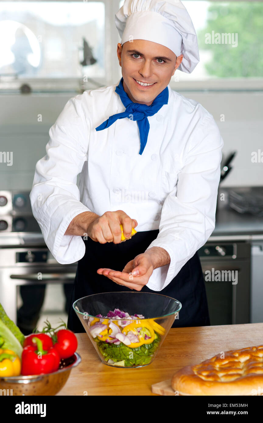 Chef preparing the salad Stock Photo - Alamy