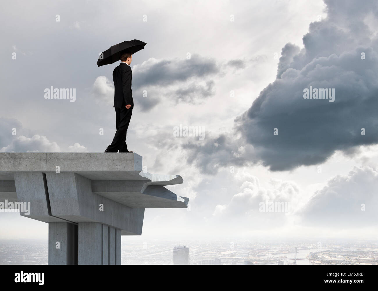 Businessman standing on bridge Stock Photo - Alamy