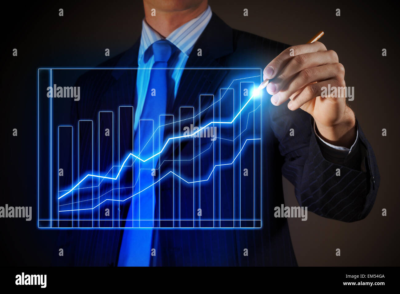 Business man drawing graphics Stock Photo - Alamy
