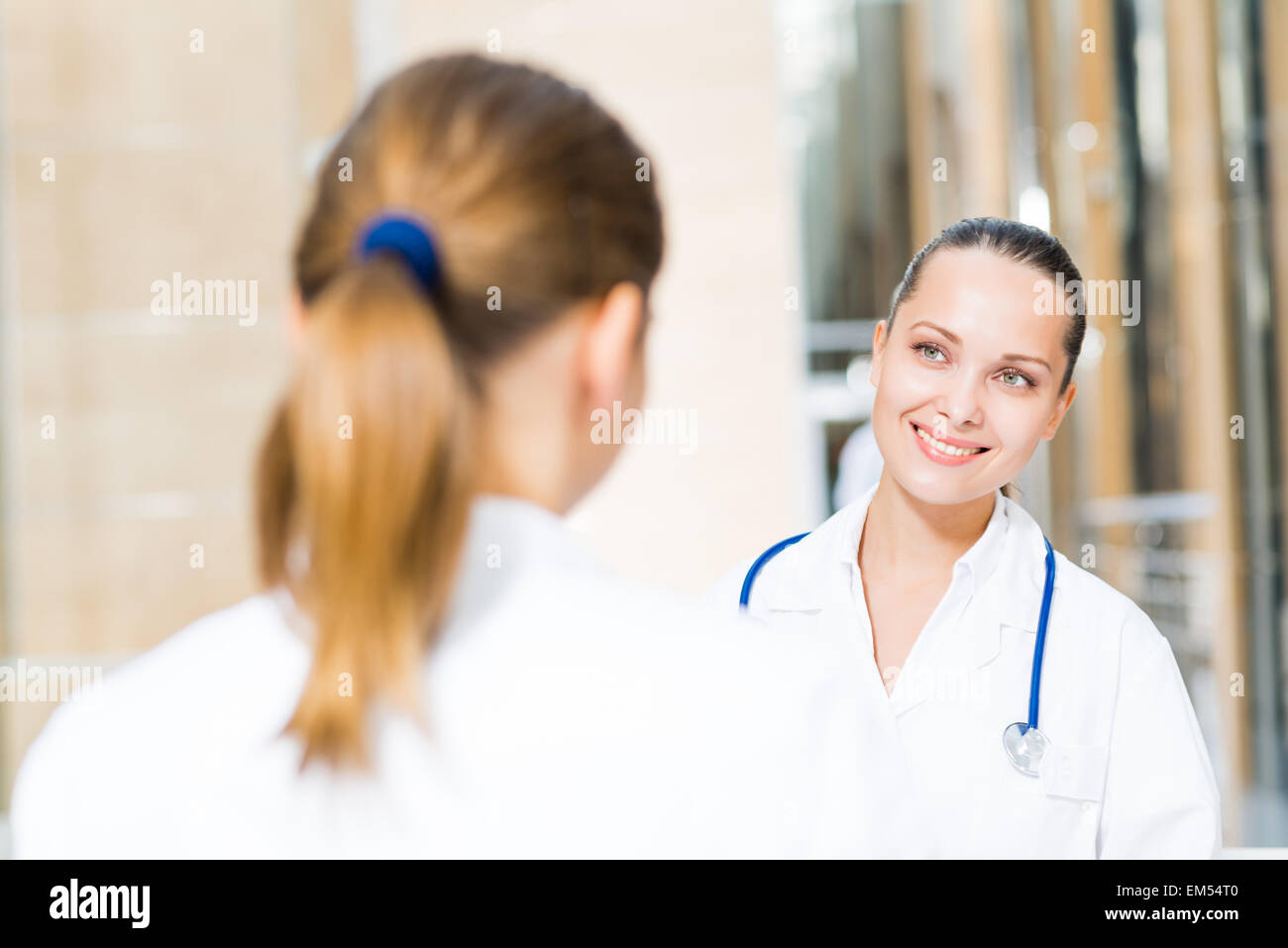 Two care workers talking hi-res stock photography and images - Alamy