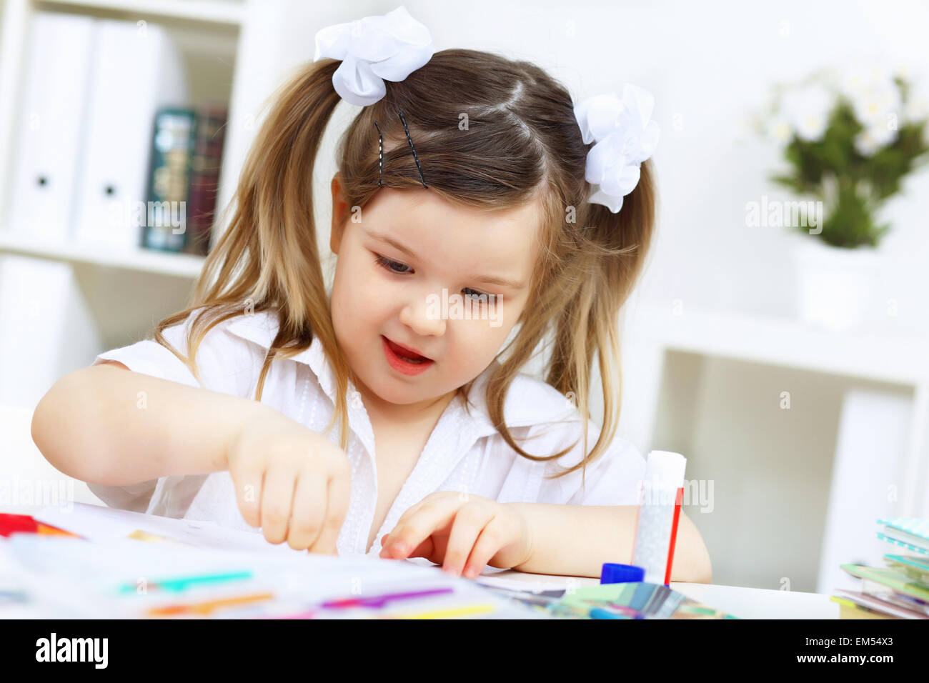 Little girl studying Stock Photo - Alamy Little girl studying Stock Photo - Alamy