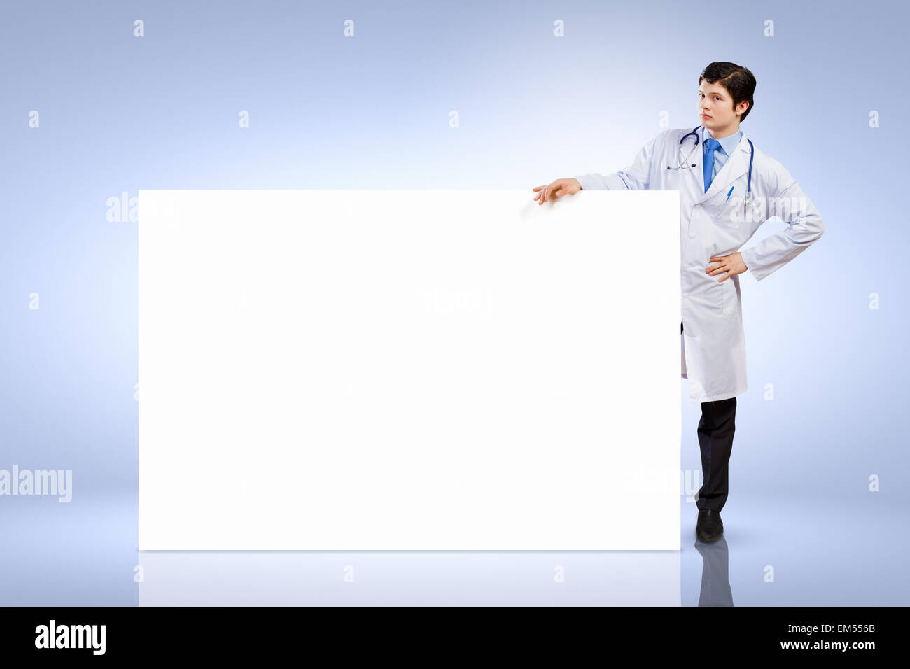 Male doctor with banner Stock Photo - Alamy