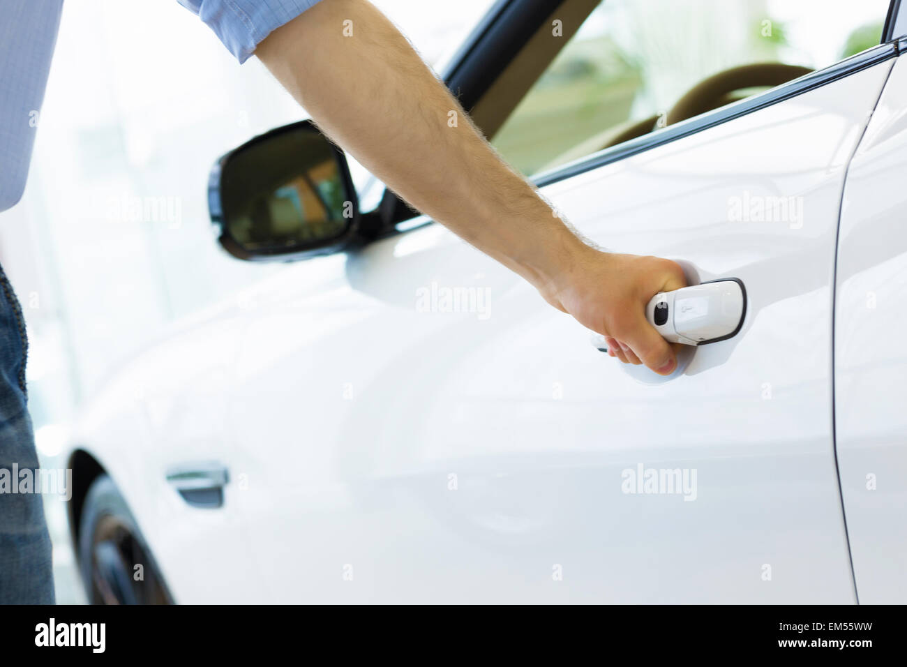 Man opening car Stock Photo - Alamy
