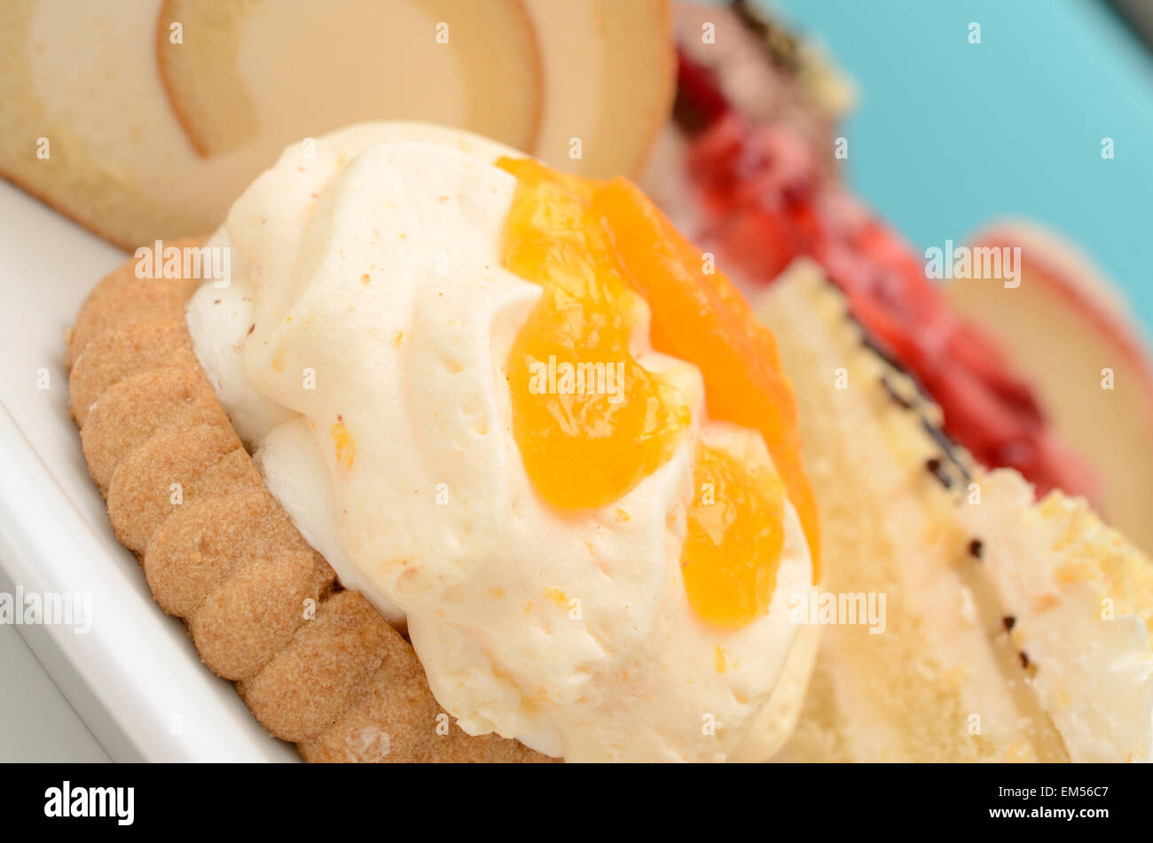 Sweet cake with mandarin on a plate Stock Photo - Alamy