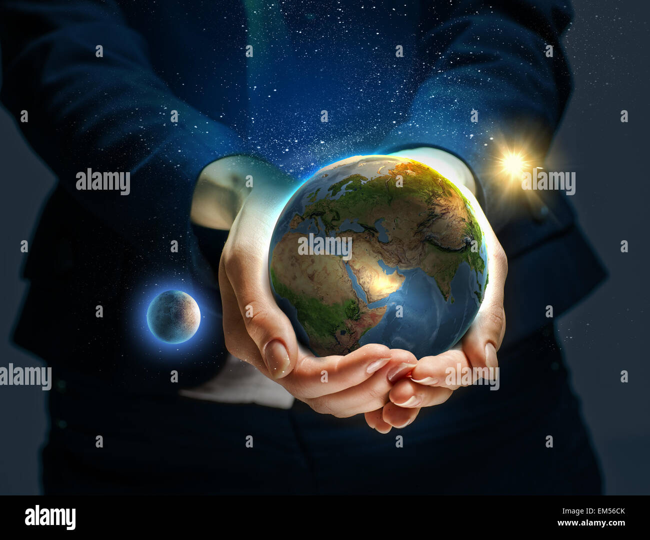 Earth planet in hands Stock Photo - Alamy