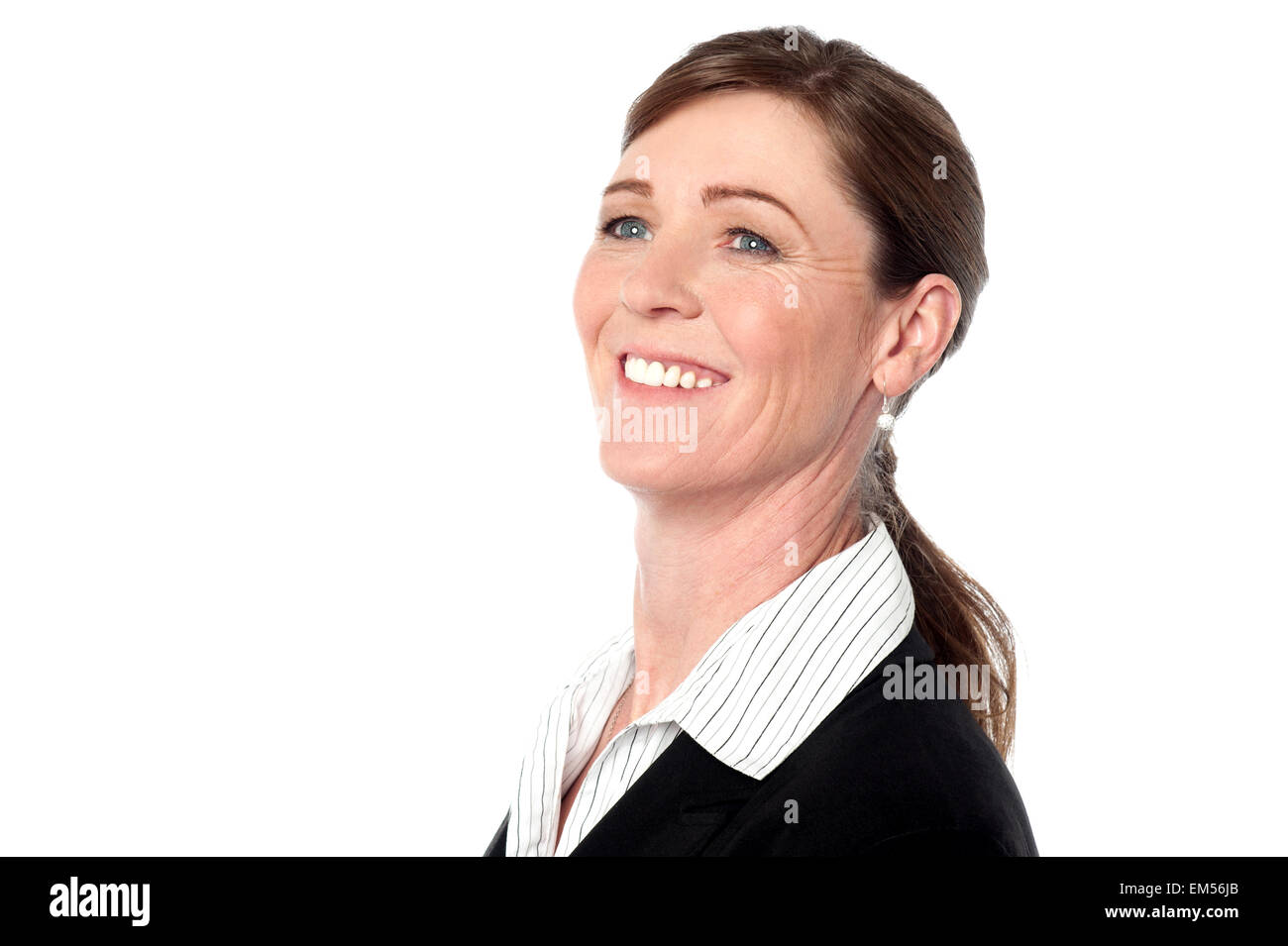 Female business executive looking away Stock Photo - Alamy