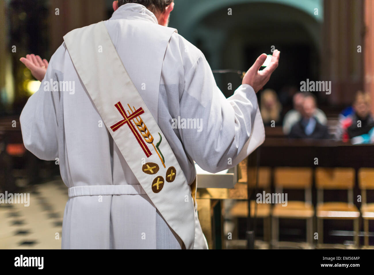 Priest during a ceremony/Mass Stock Photo - Alamy