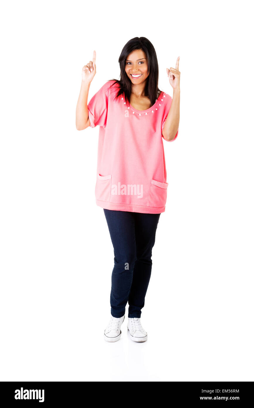 Happy , excited young woman pointing on copy space Stock Photo - Alamy
