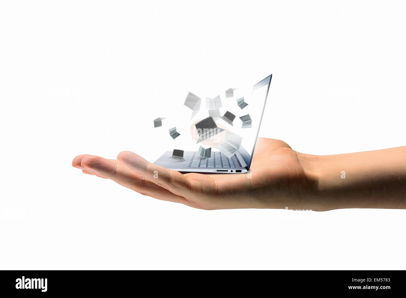 Laptops in hand Stock Photo - Alamy