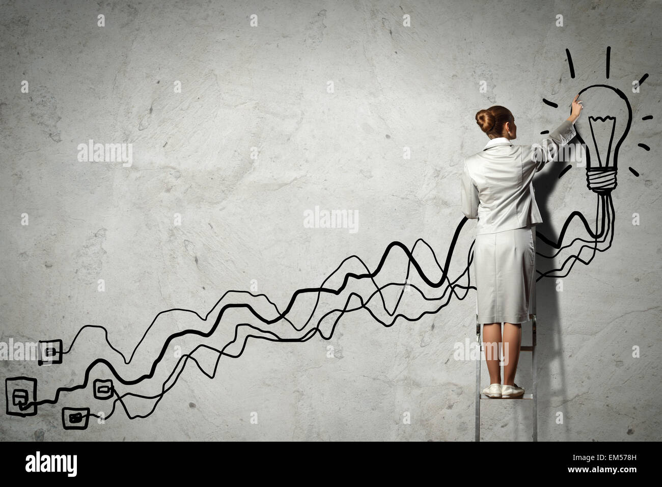 Woman standing on ladder drawing hi-res stock photography and images ...