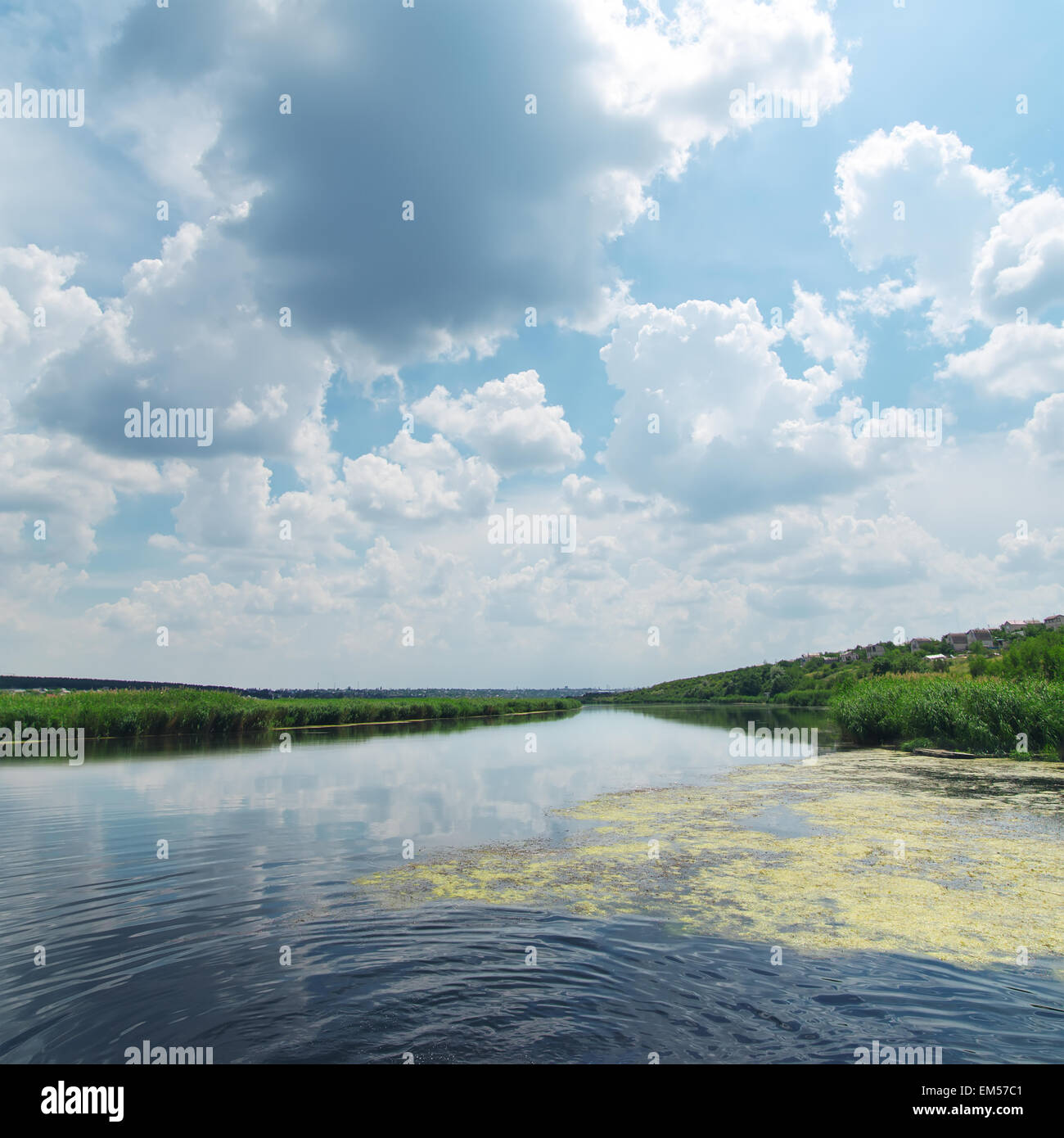 dark low clouds and river close up Stock Photo - Alamy