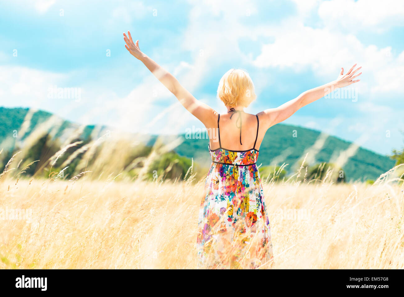 Woman enjoying the nature Stock Photo - Alamy
