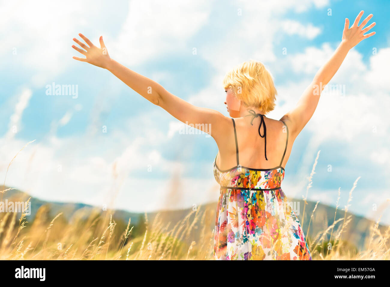 Woman enjoying the nature Stock Photo - Alamy